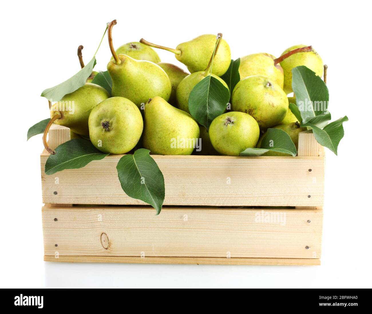Juicy flavorful pears in box isolated on white Stock Photo - Alamy