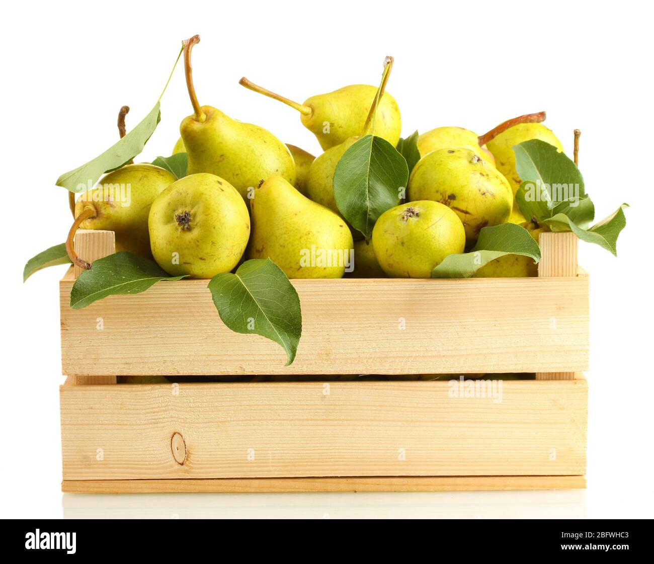 Juicy flavorful pears in box isolated on white Stock Photo - Alamy