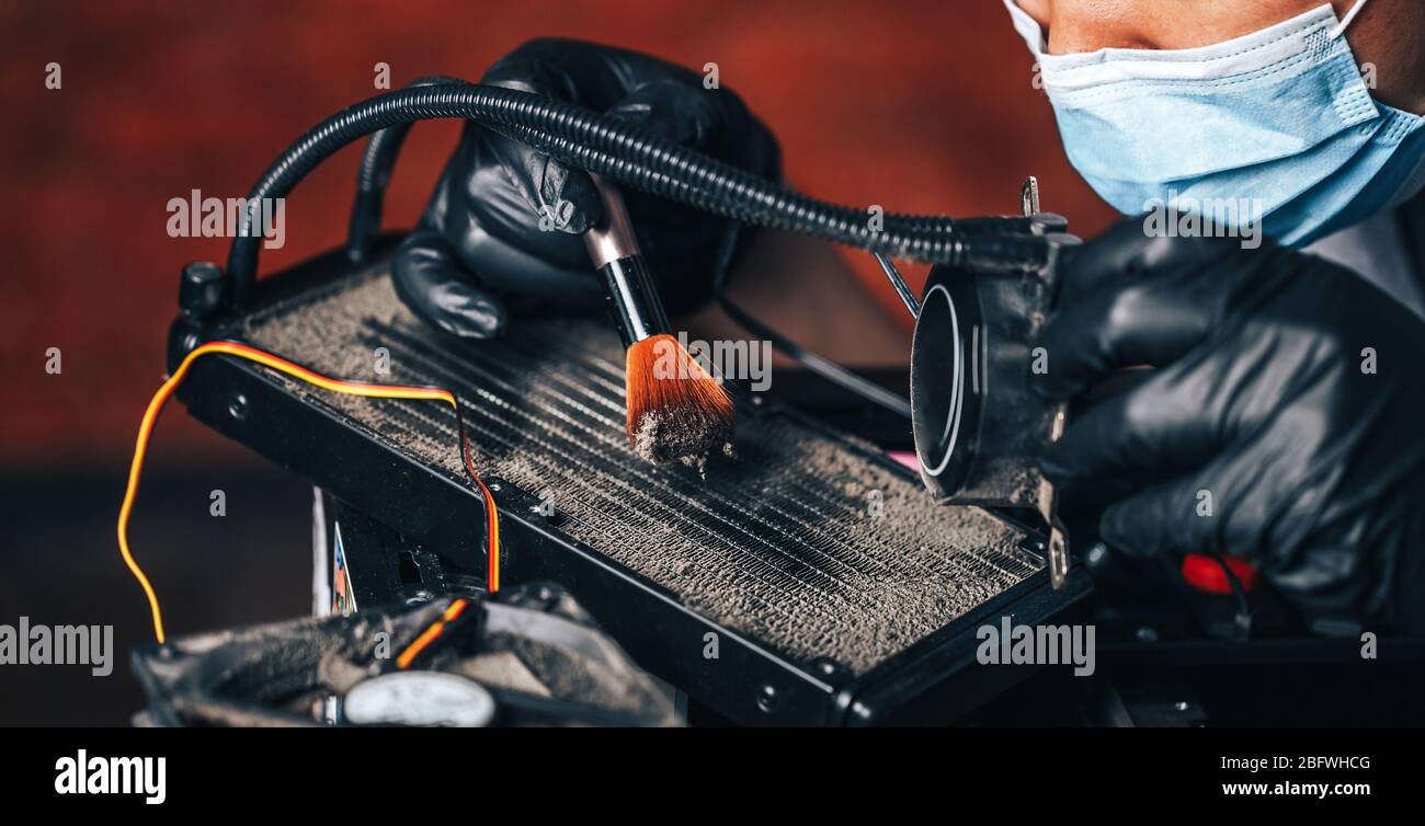 Computer repair man cleaning hi-res stock photography and images - Alamy