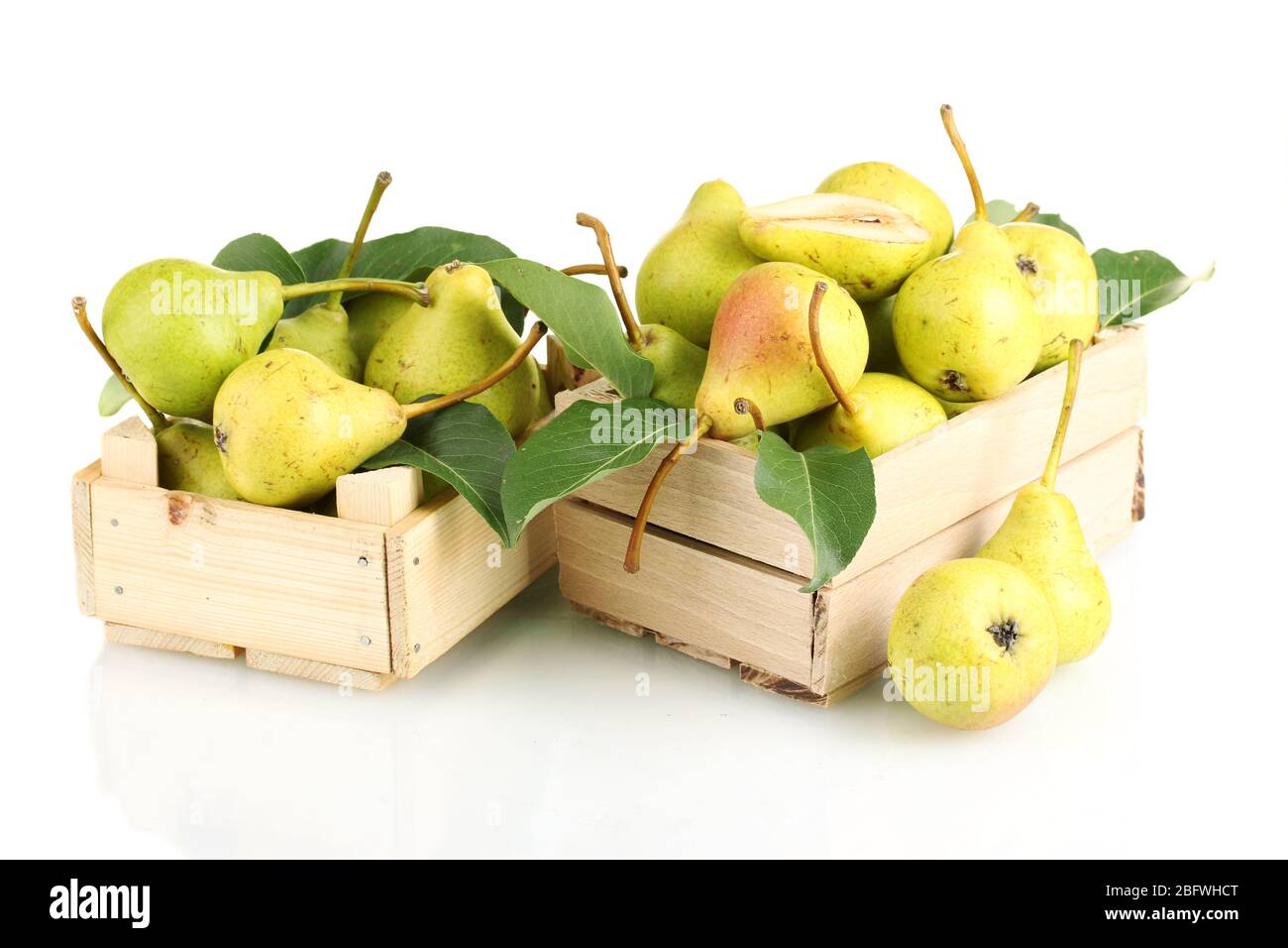 Juicy flavorful pears in boxes isolated on white Stock Photo - Alamy