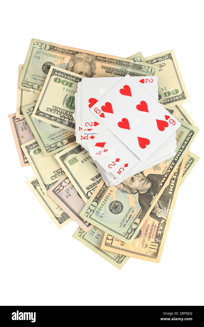 Dollars and a deck of playing cards isolated on white Stock Photo - Alamy