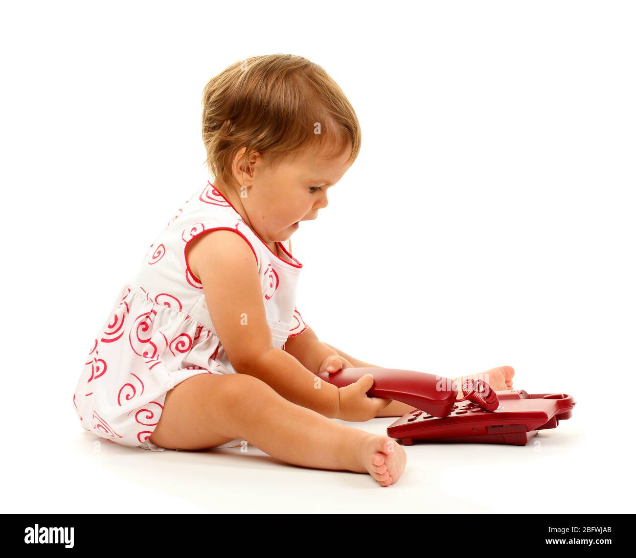 Cute baby with telephone isolated on white Stock Photo - Alamy