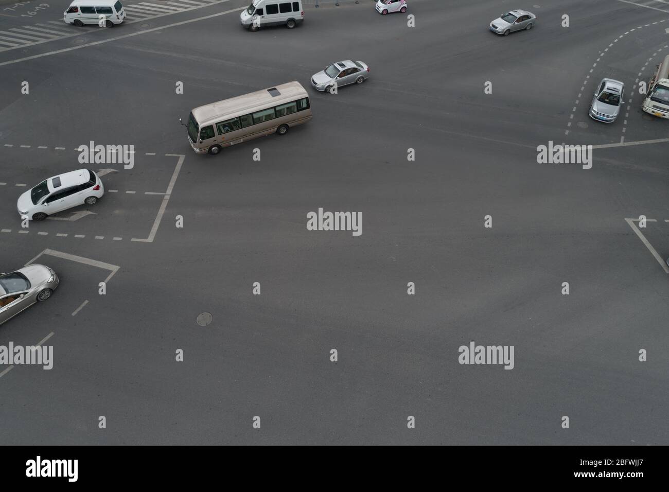Aerial view on busy traffic intersection Stock Photo - Alamy