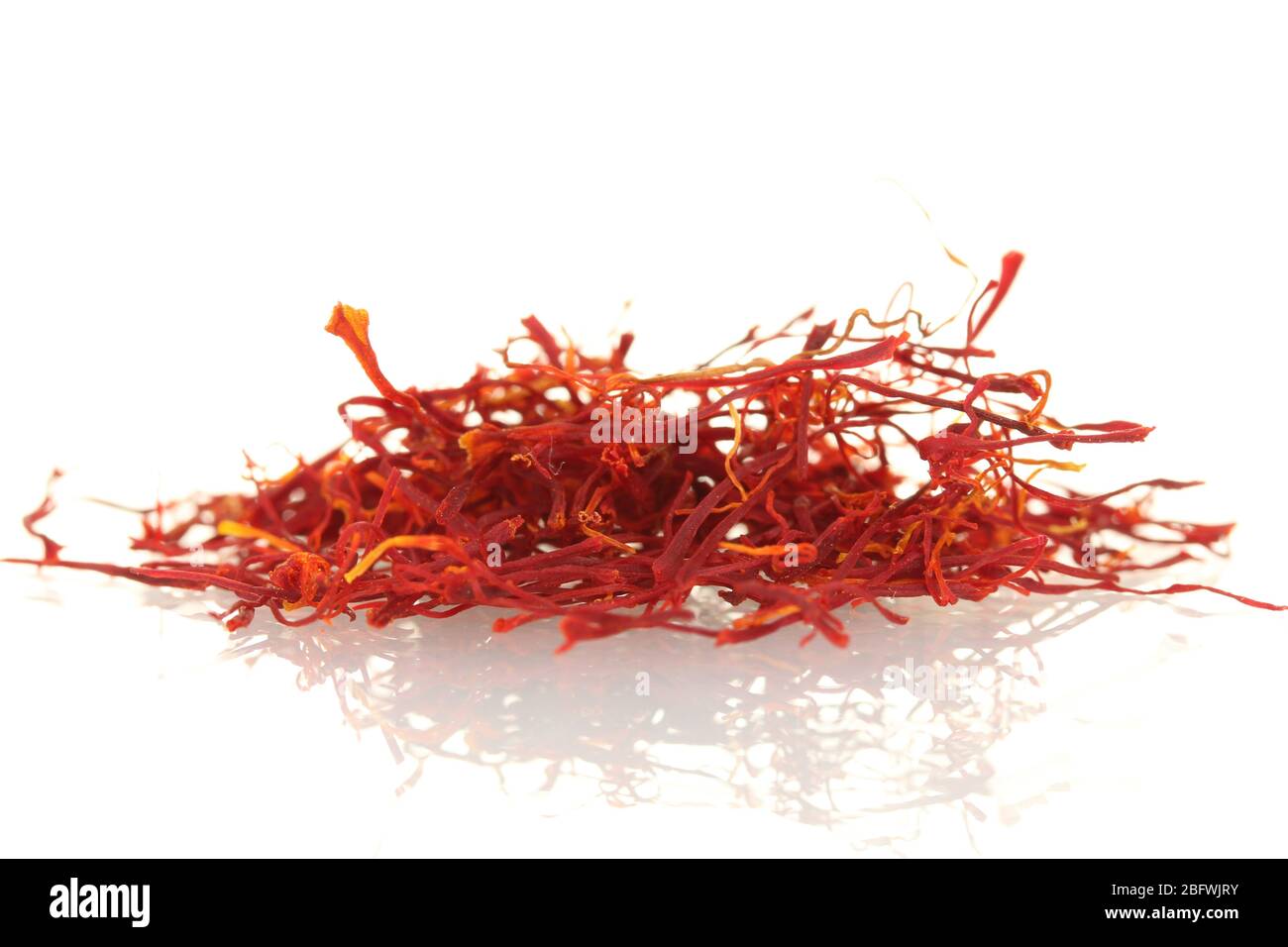 stigmas of saffron isolated on white background Stock Photo - Alamy