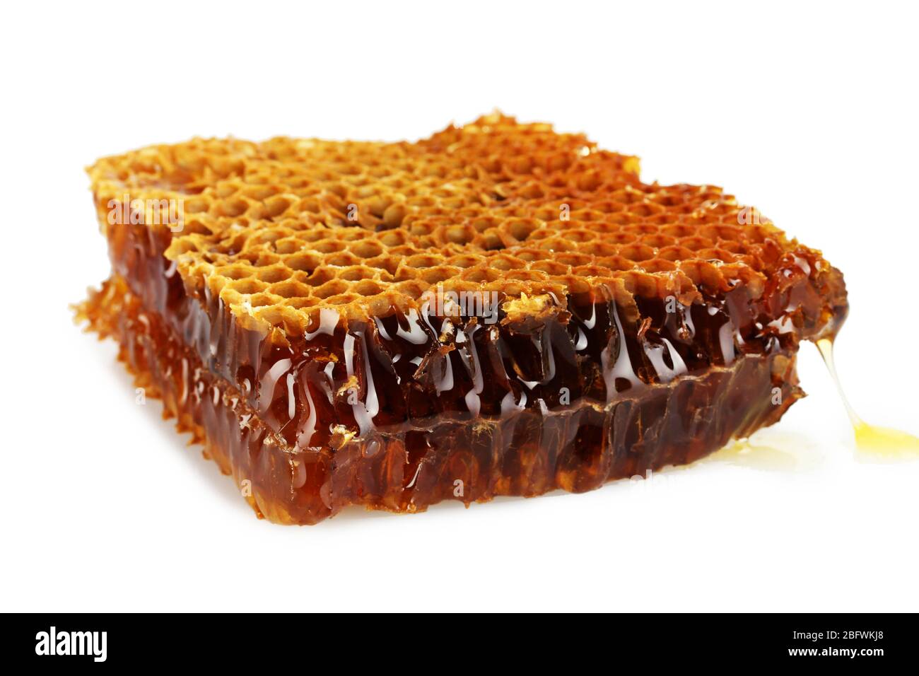 sweet honeycomb with honey, isolated on white Stock Photo - Alamy