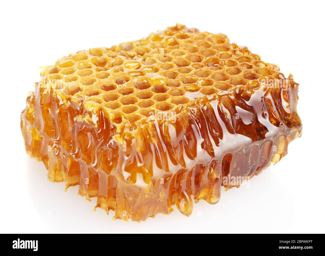 sweet honeycomb with honey, isolated on white Stock Photo - Alamy