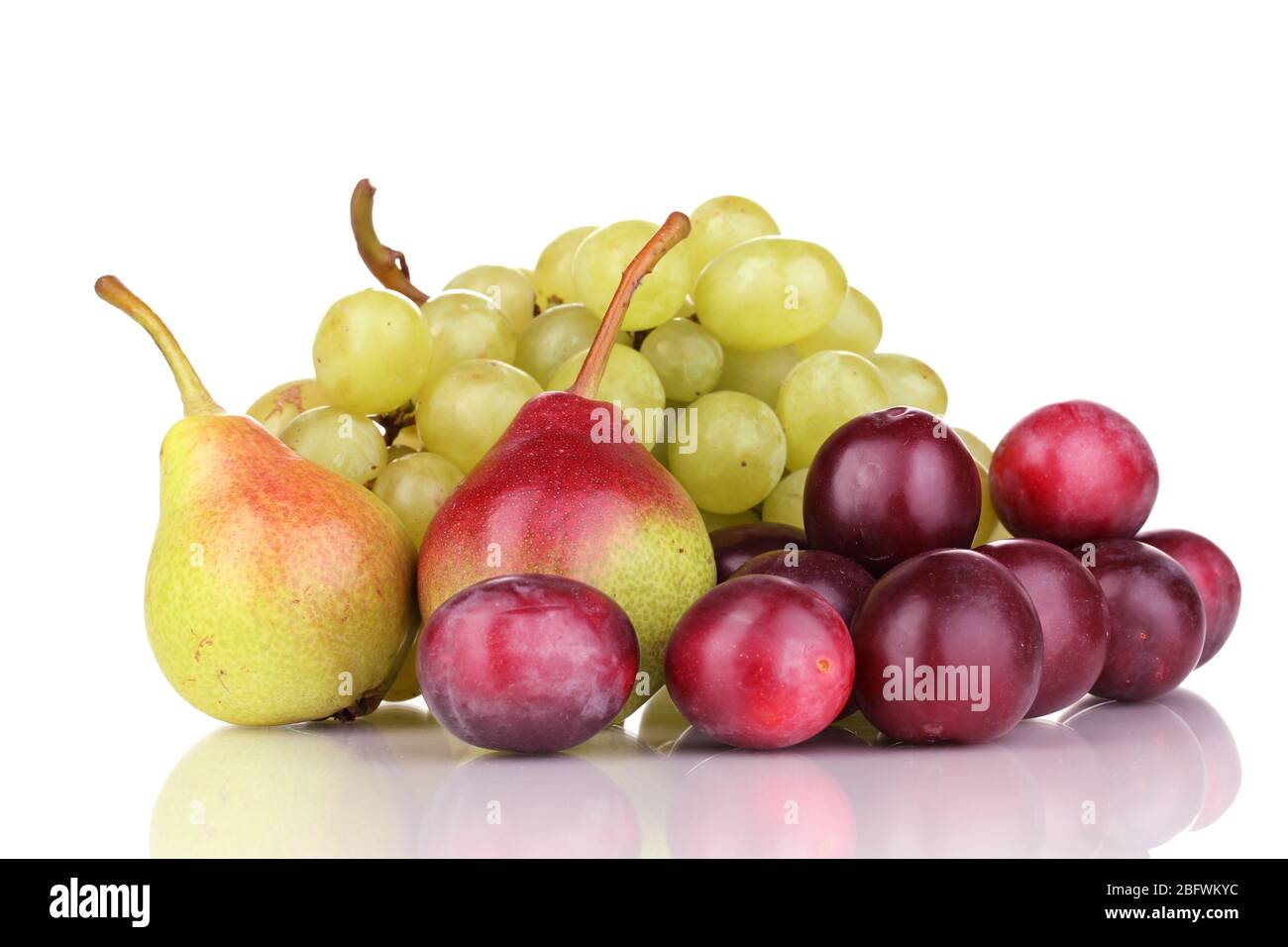 Mix of ripe sweet fruits and berries isolated on white Stock Photo - Alamy