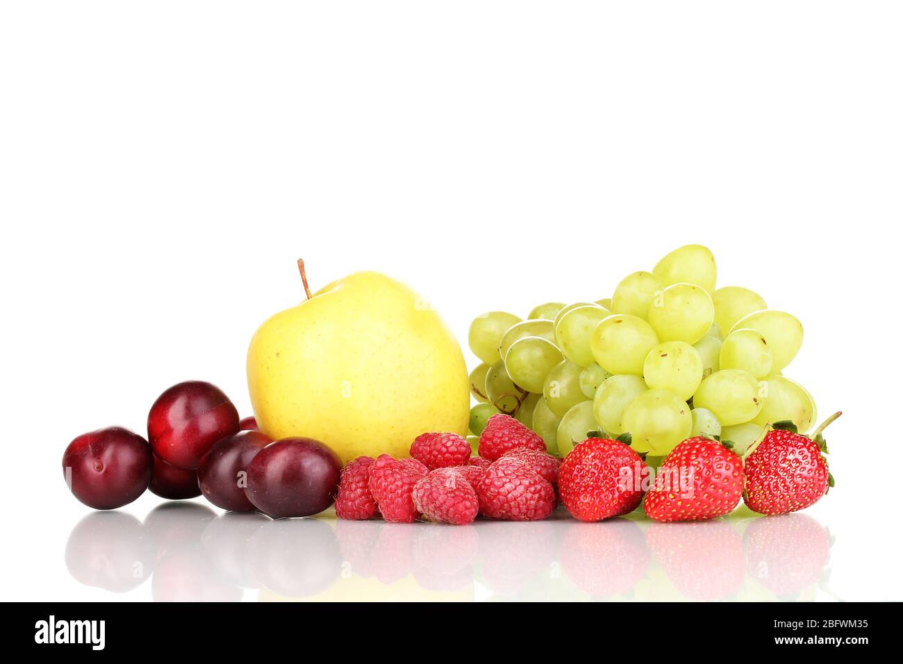 Mix of ripe sweet fruits and berries isolated on white Stock Photo - Alamy