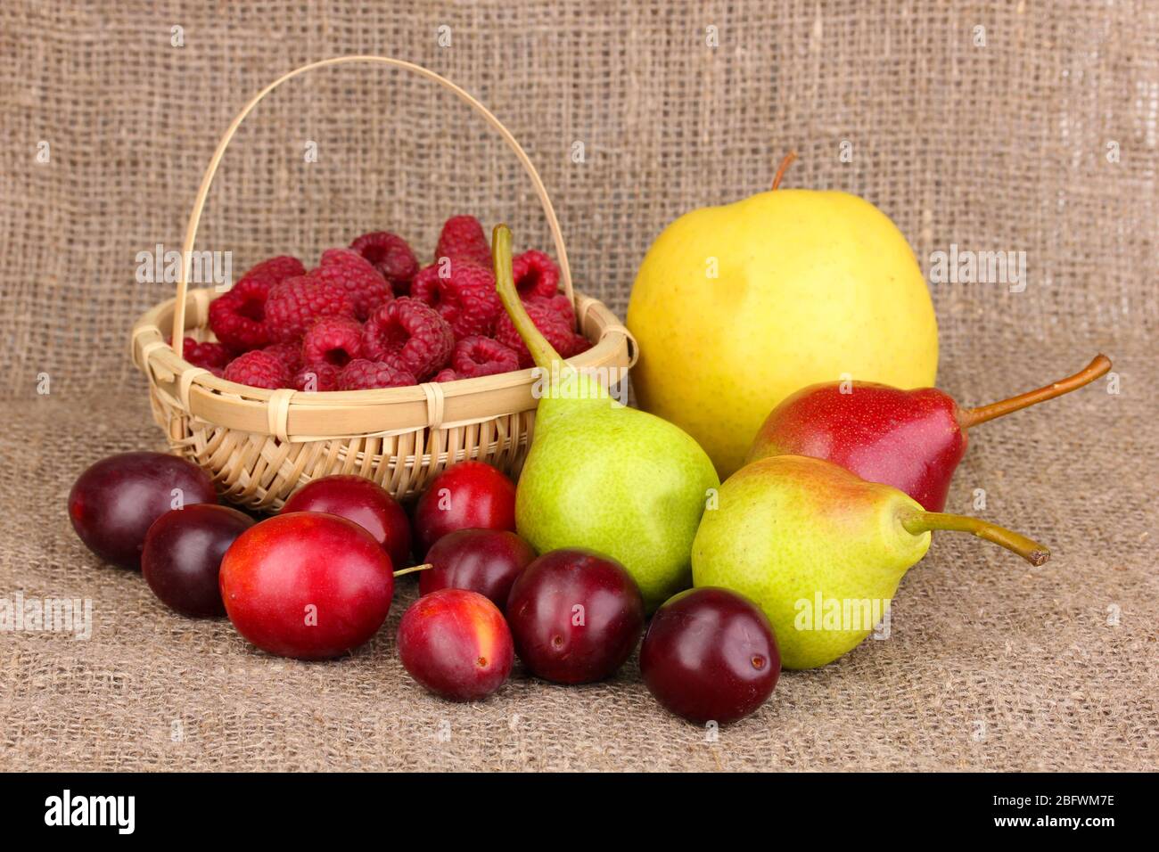 ripe sweet fruits and berries on sackcloth Stock Photo - Alamy