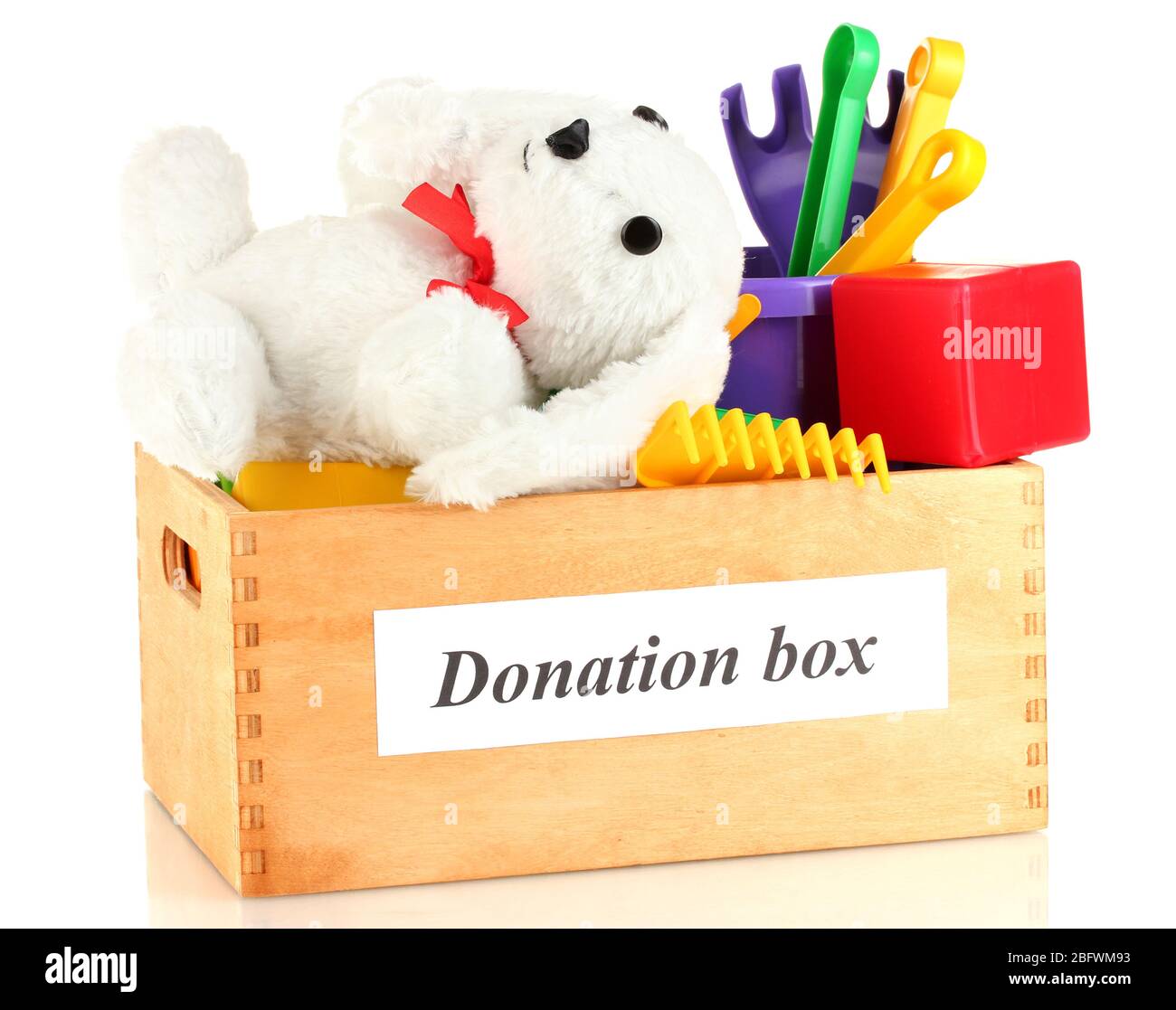 Donation box with children toys isolated on white Stock Photo - Alamy