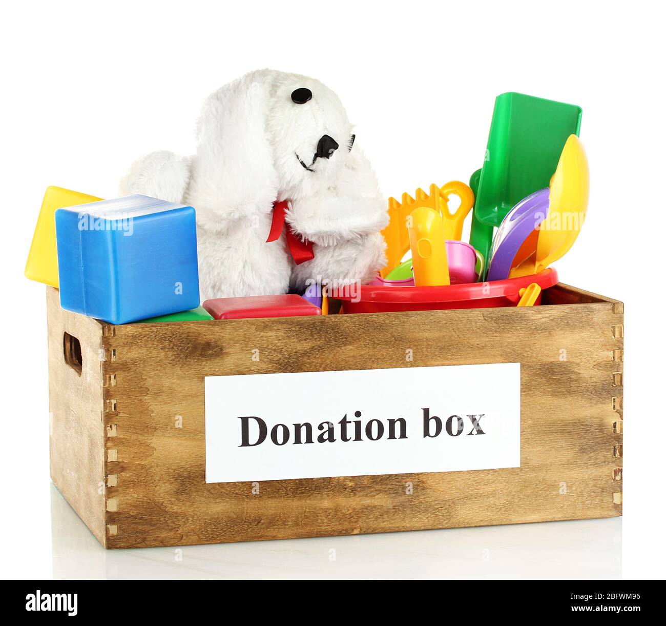 Donation box with children toys isolated on white Stock Photo - Alamy
