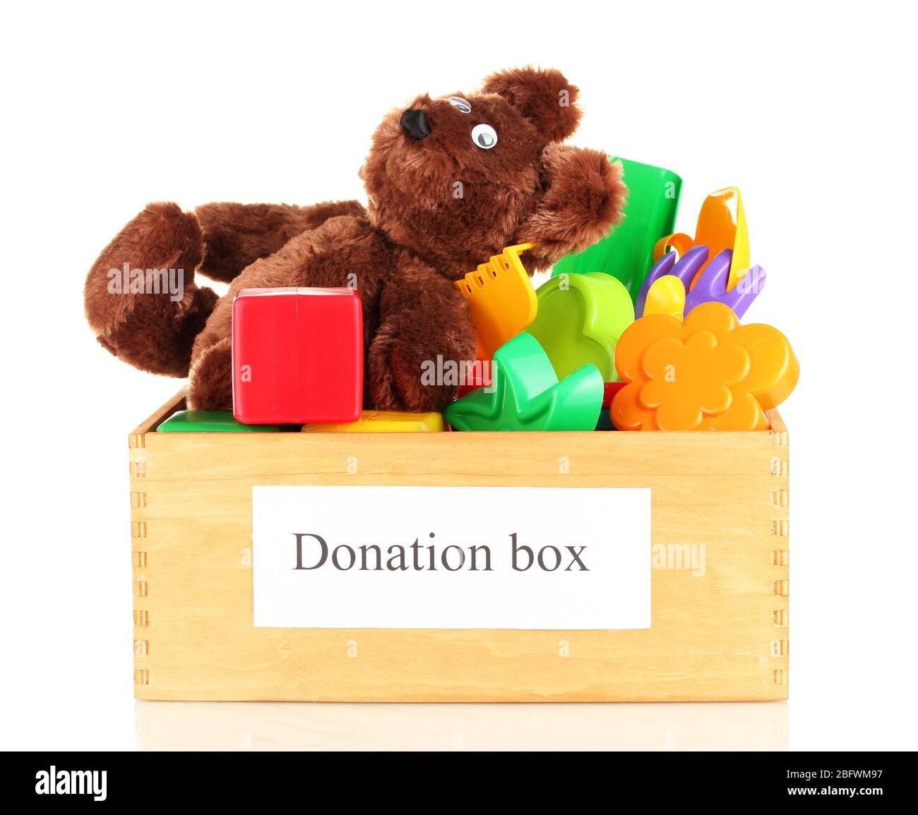 Donation box with children toys isolated on white Stock Photo - Alamy