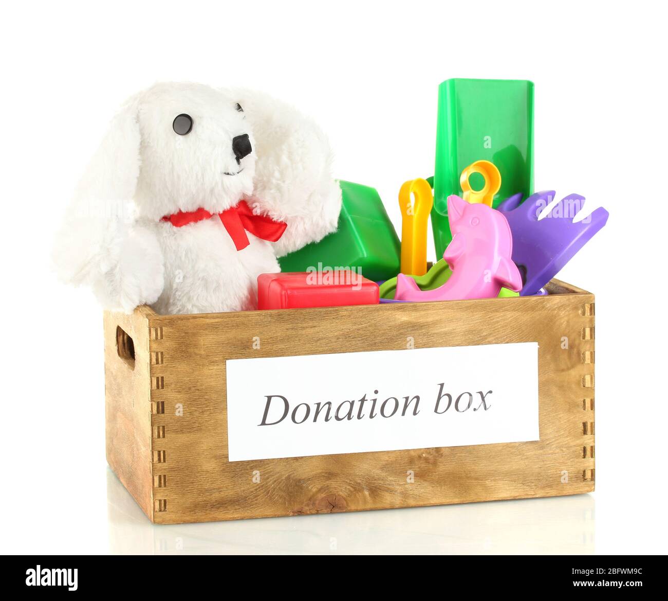 Donation box with children toys isolated on white Stock Photo - Alamy
