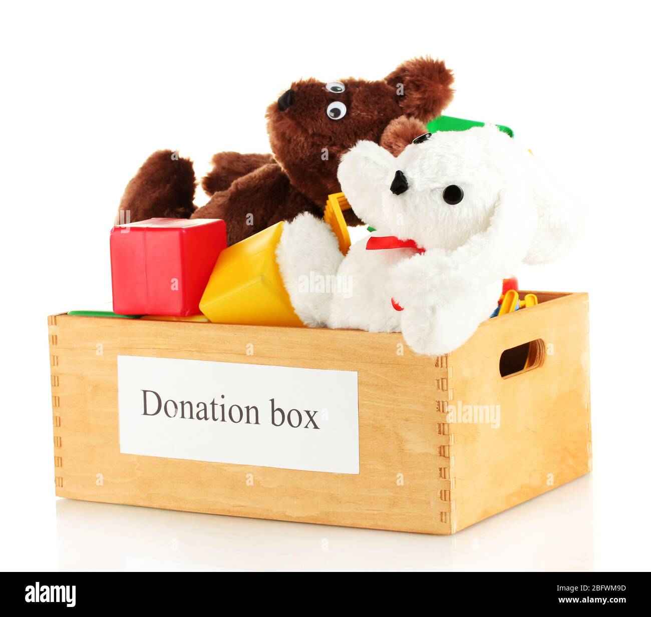Donation box with children toys isolated on white Stock Photo - Alamy