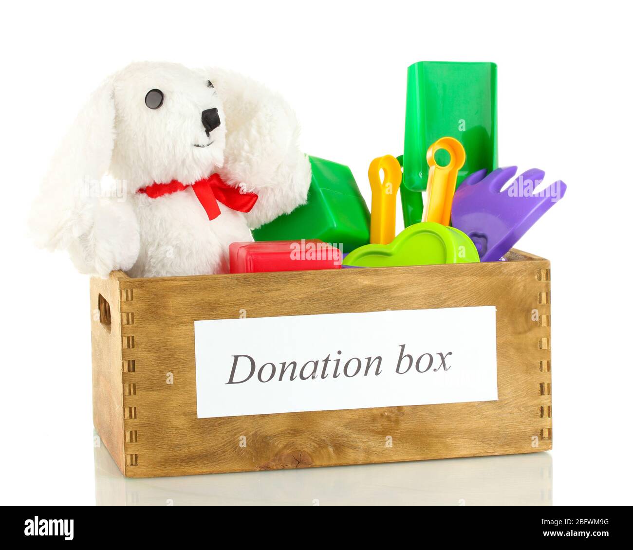 Donation box with children toys isolated on white Stock Photo - Alamy