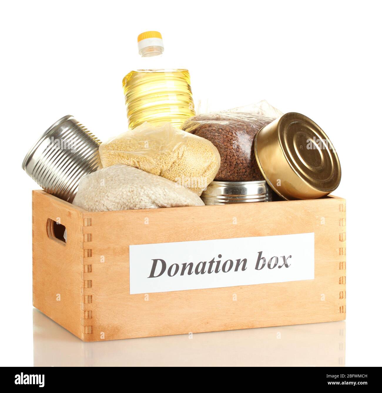 Donation box with food isolated on white Stock Photo - Alamy