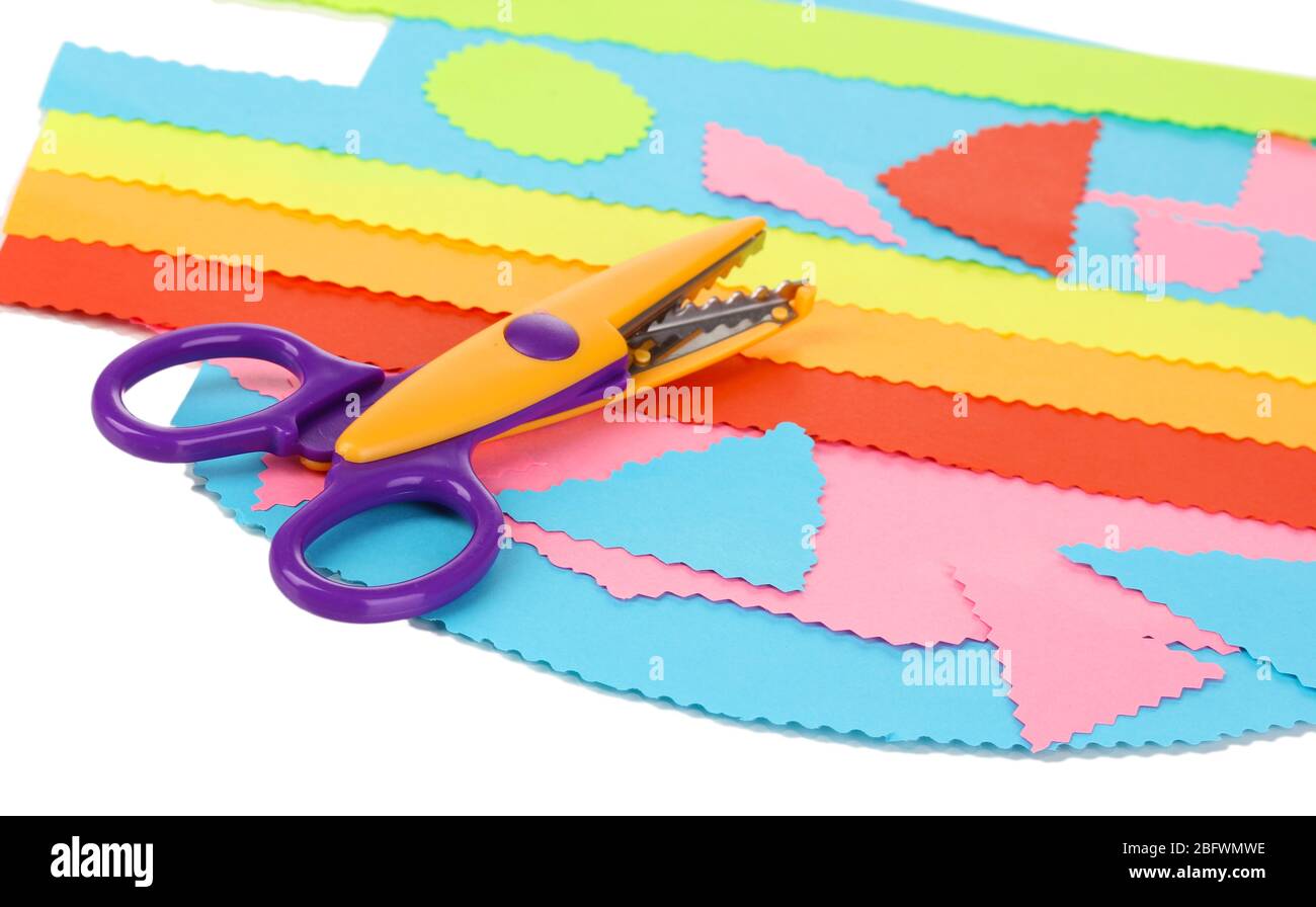 Colorful zigzag scissors with color paper isolated on white Stock Photo ...