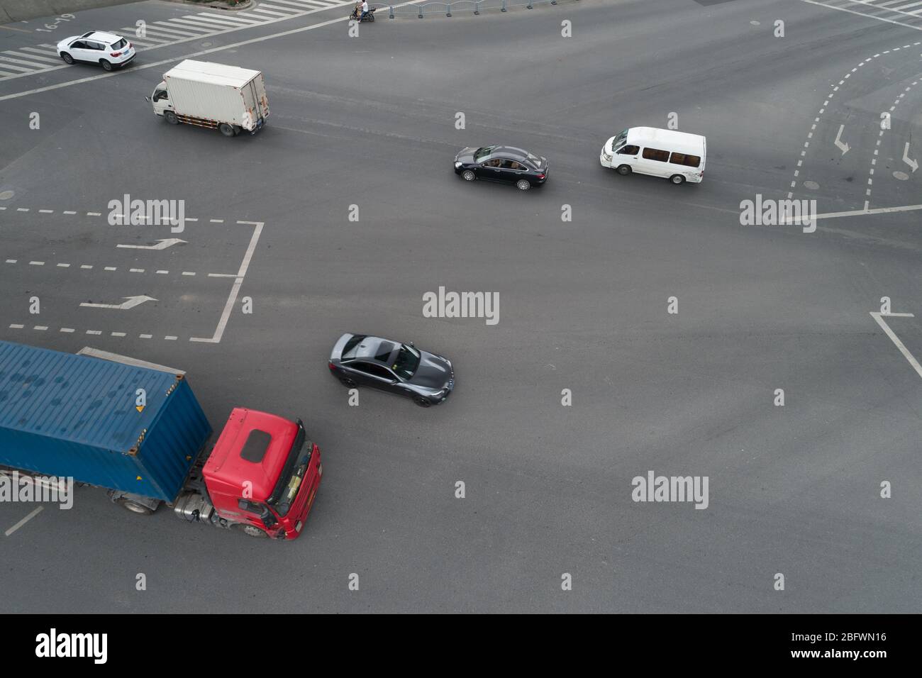 Aerial view on busy traffic intersection Stock Photo - Alamy
