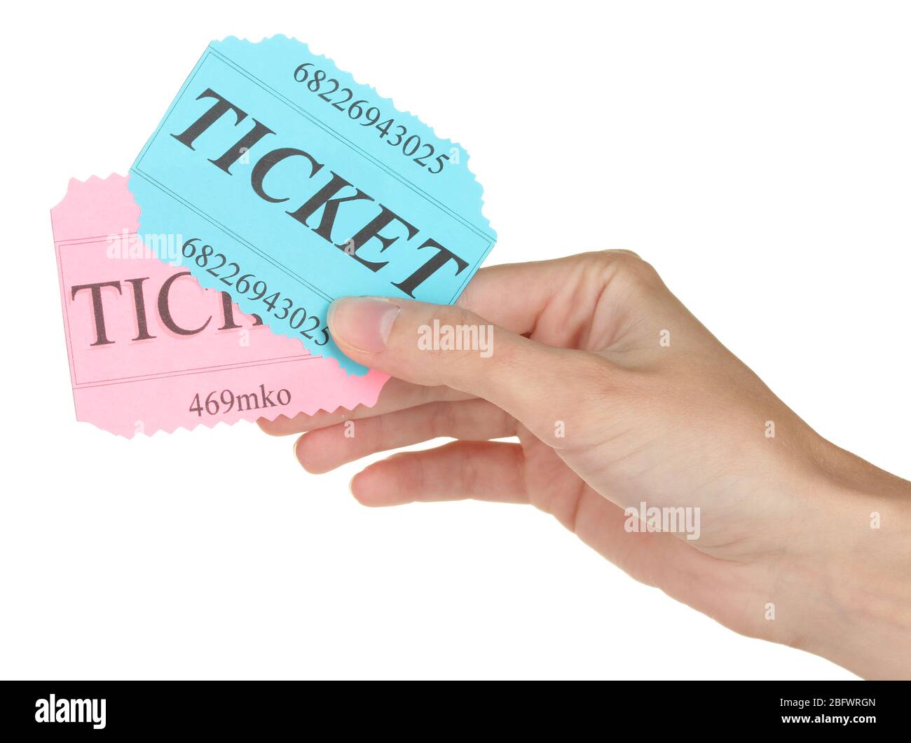 Woman's hand holding a colorful tickets on white background close-up ...