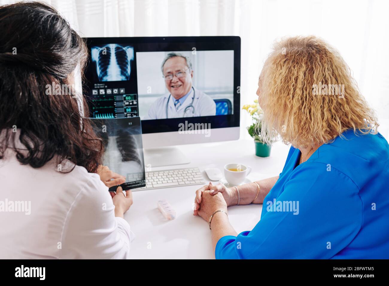 Female patient having physical exam hi-res stock photography and images ...