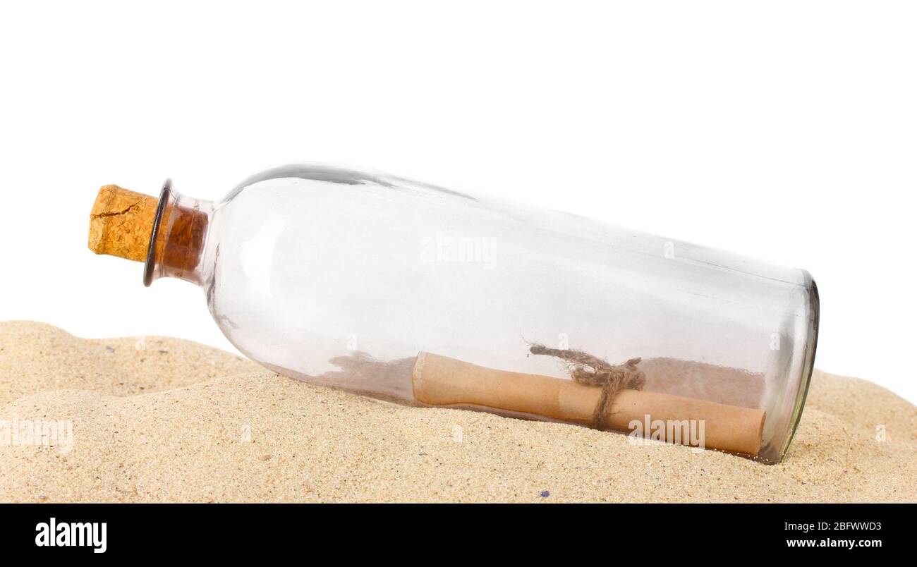 Glass bottle with note inside on sand isolated on white Stock Photo - Alamy