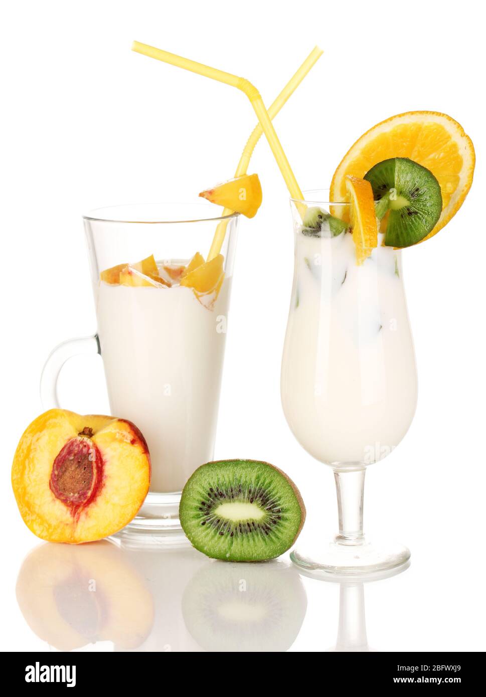 Delicious milk shakes with fruit isolated on white Stock Photo - Alamy