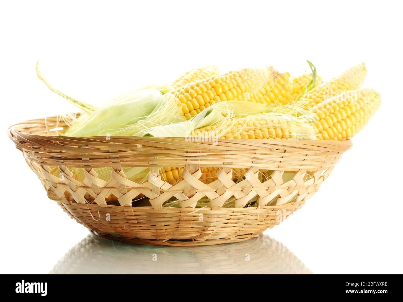 fresh corn in basket, isolated on white Stock Photo - Alamy