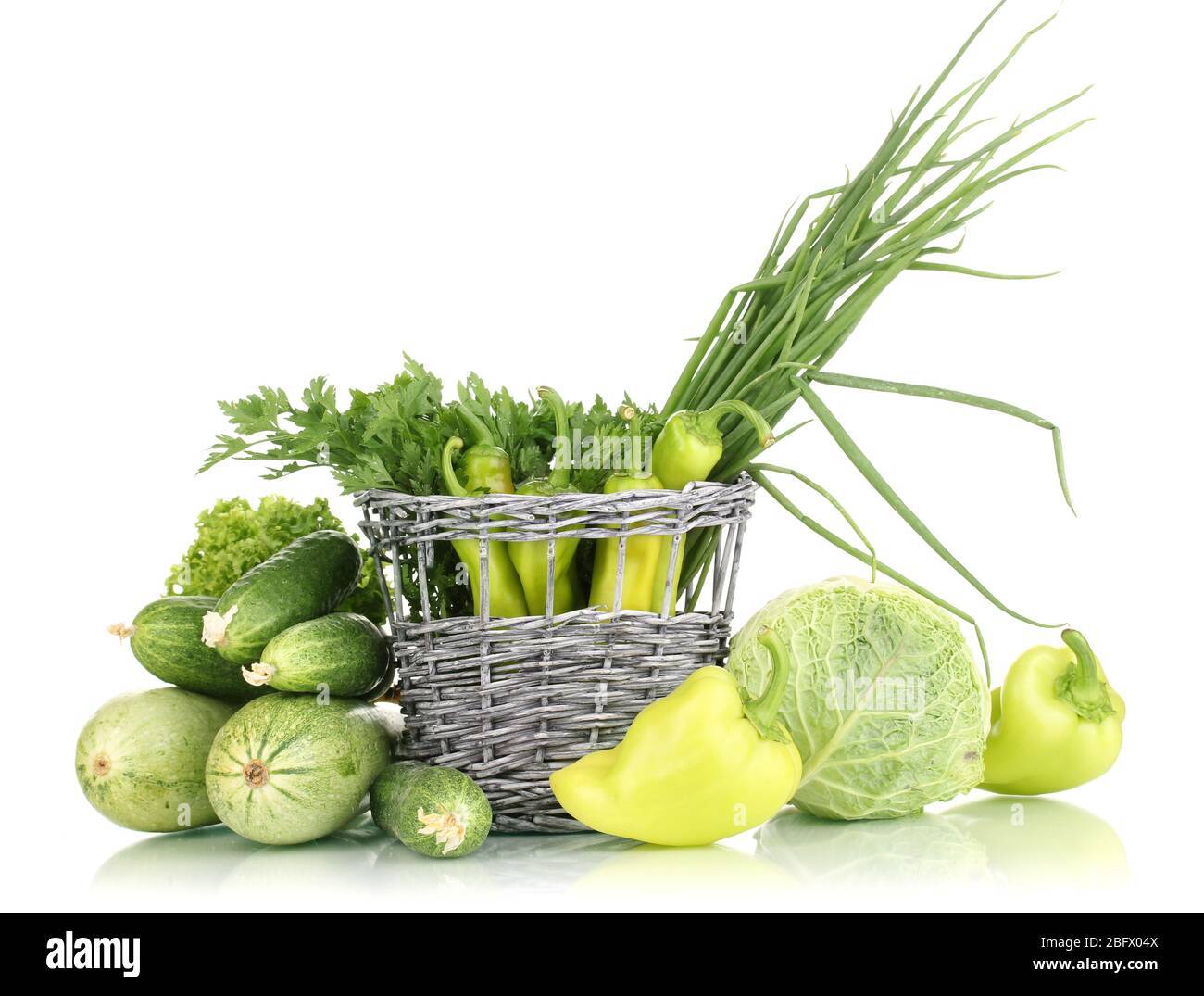 fresh green vegetables in basket isolated on white Stock Photo - Alamy