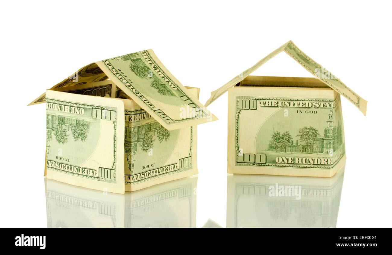 Dollar houses isolated on white background close-up Stock Photo - Alamy