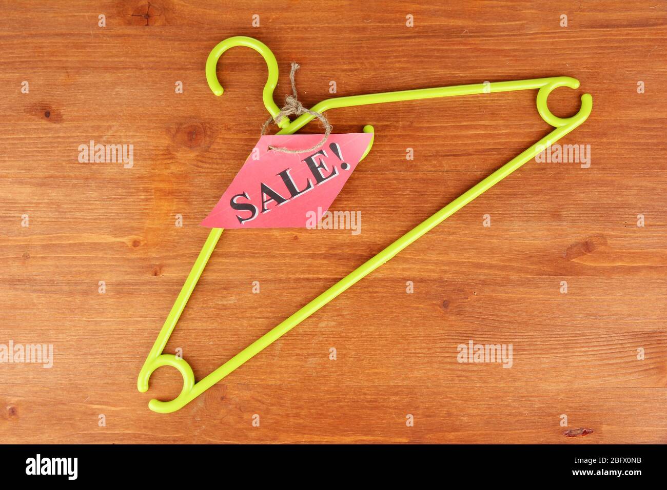 Red tag sale wooden hanger hi-res stock photography and images - Alamy