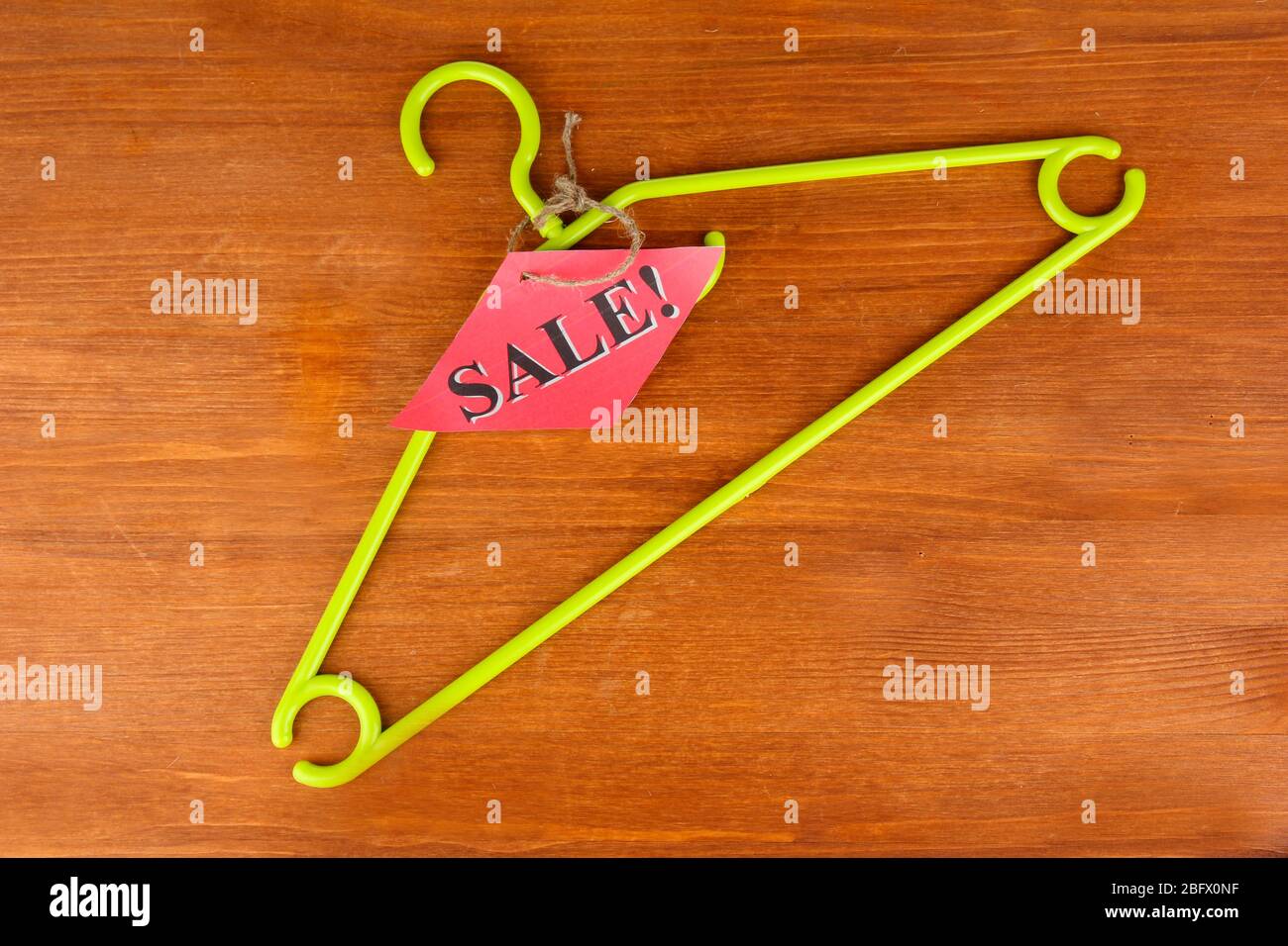 Red tag sale wooden hanger hi-res stock photography and images - Alamy