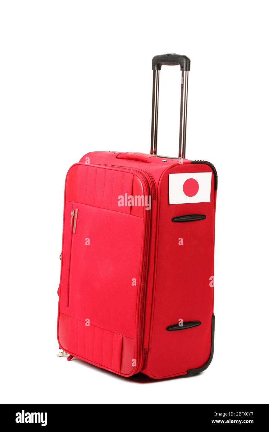 red suitcase with sticker with flag of Japan isolated on white Stock ...