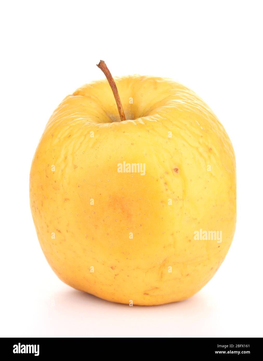 Yellow apple as problem skin concept isolated on white Stock Photo - Alamy