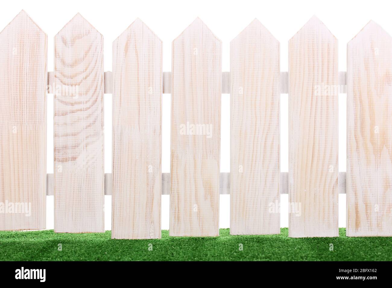 wooden fence and green grass isolated on white Stock Photo - Alamy