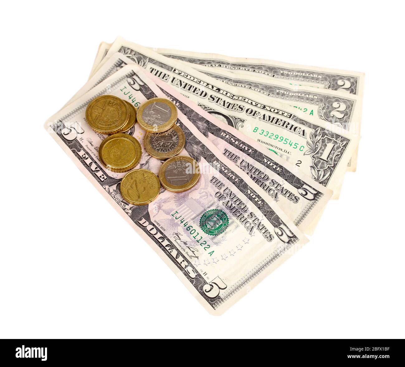 Dollar bills and coins isolated on white Stock Photo - Alamy