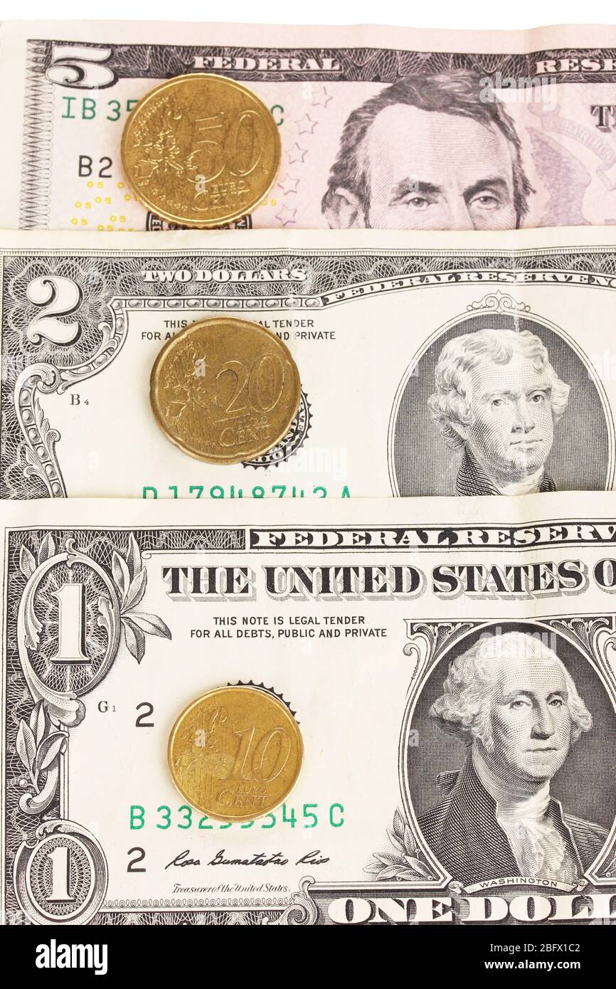 Dollar bills and coins close-up Stock Photo - Alamy