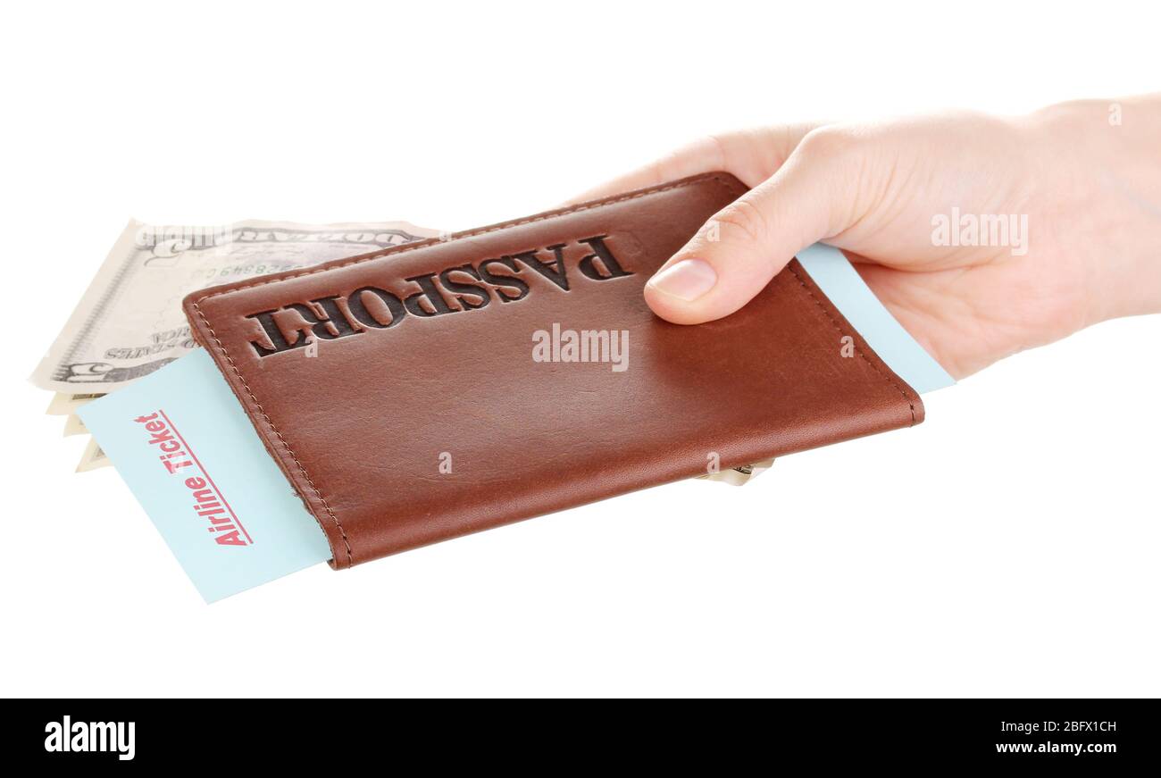 Passport and ticket in hand isolated on white Stock Photo - Alamy
