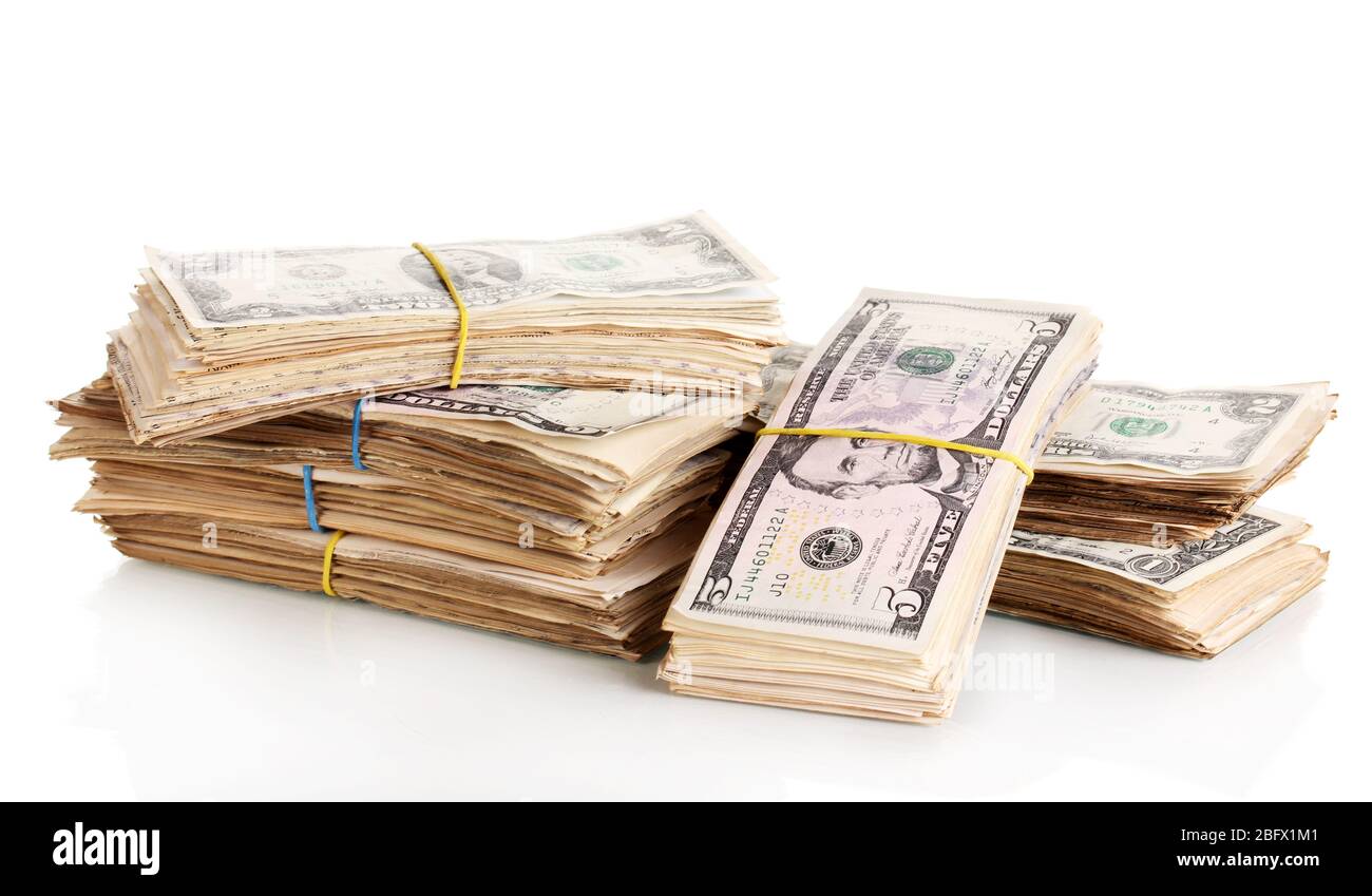 Stacks of dollars isolated on white Stock Photo - Alamy