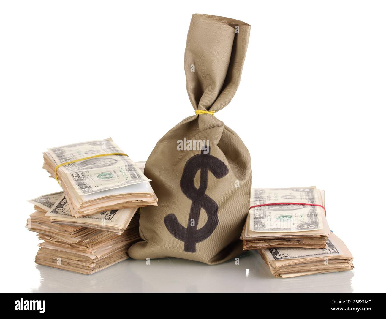 Bag with stacks of dollars isolated on white Stock Photo - Alamy