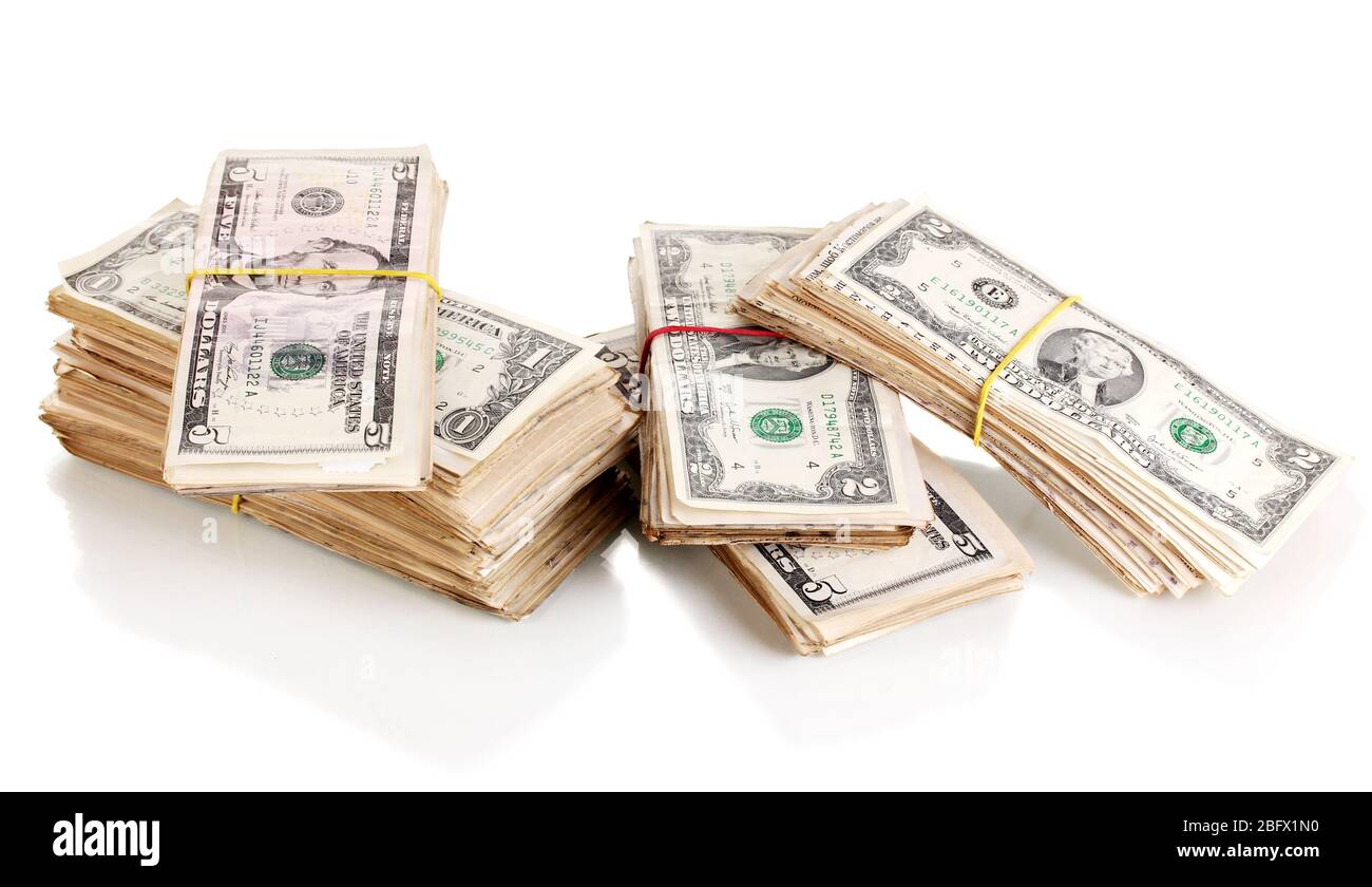 Stacks of dollars isolated on white Stock Photo - Alamy