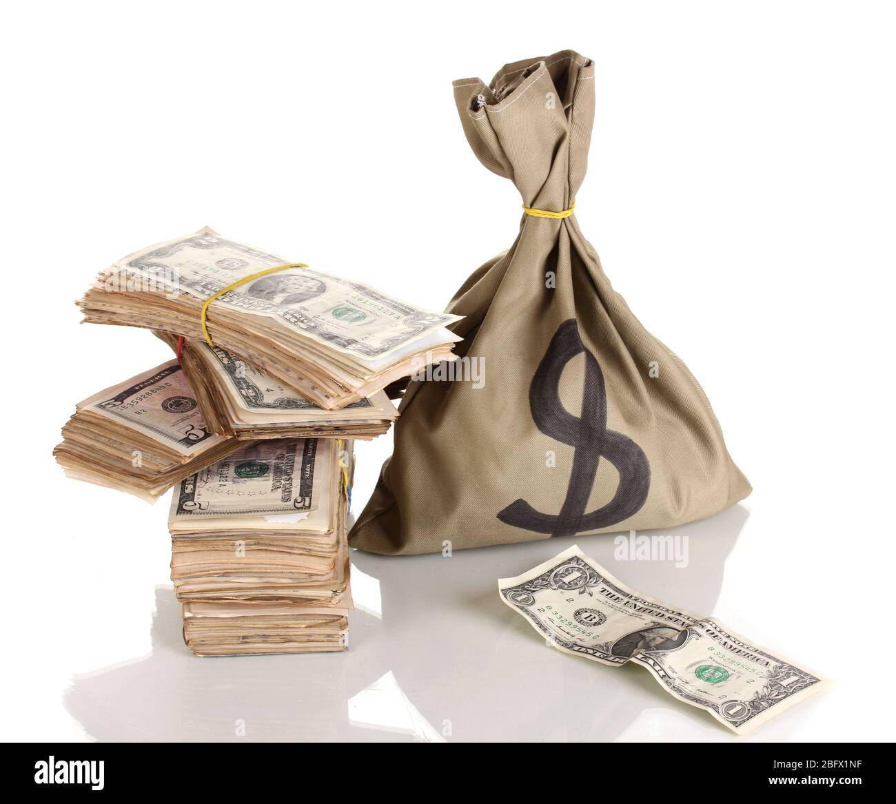 Bag with stacks of dollars isolated on white Stock Photo - Alamy