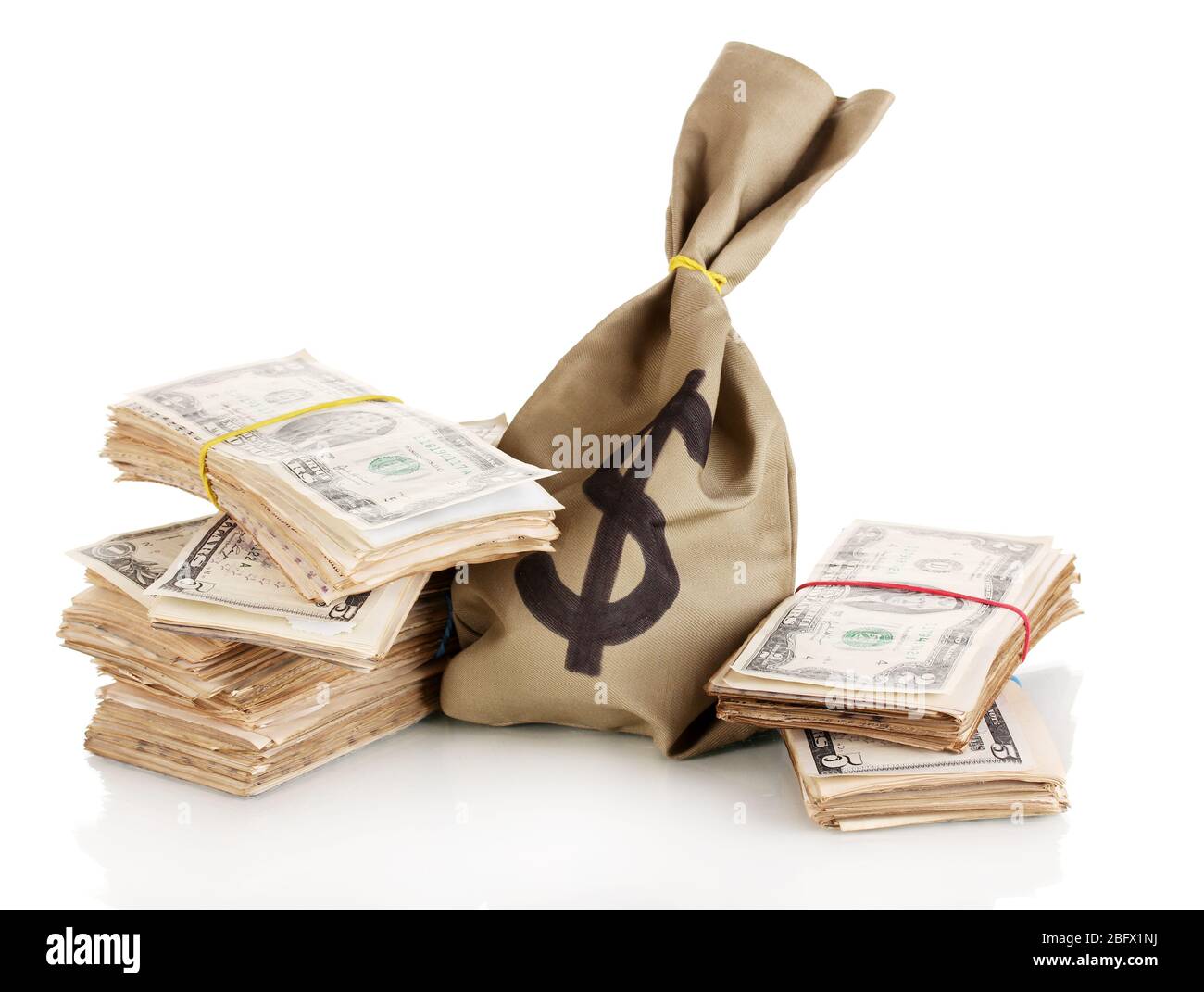 Bag with stacks of dollars isolated on white Stock Photo - Alamy