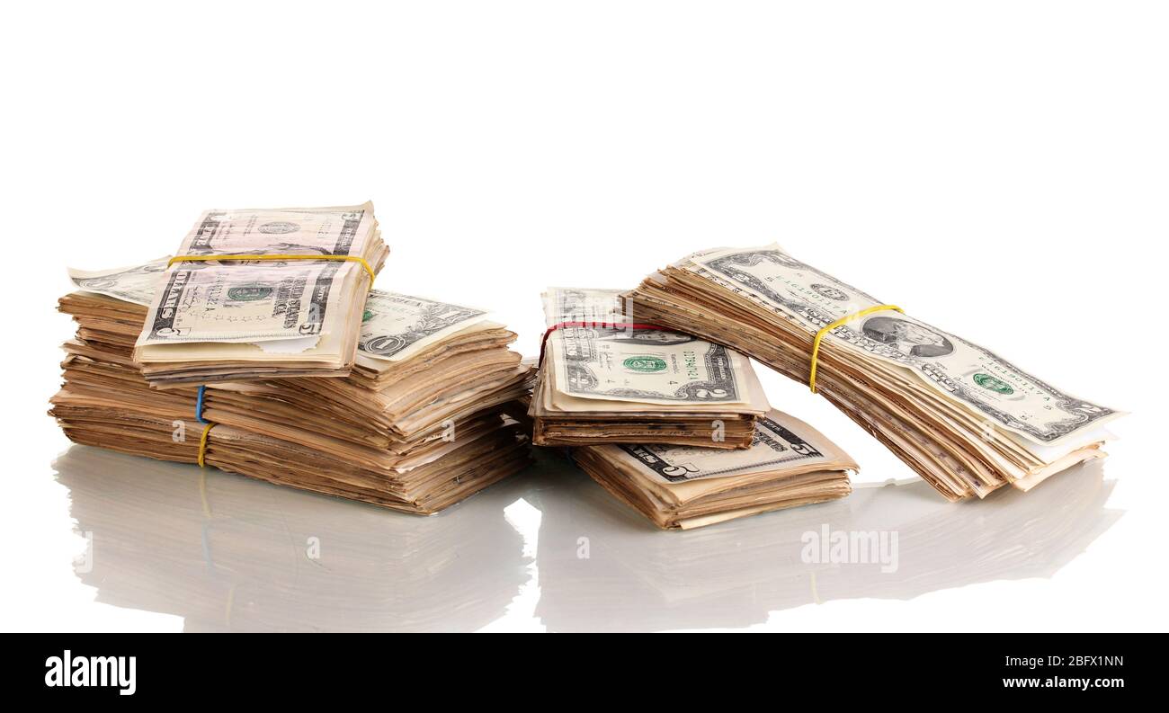 Stacks of dollars isolated on white Stock Photo - Alamy