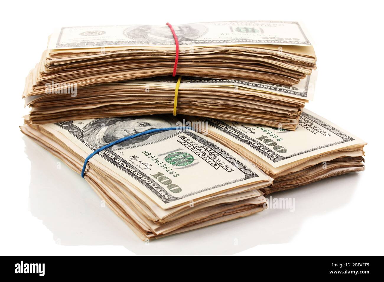 Stacks of one hundred dollars banknotes close-up isolated on white ...