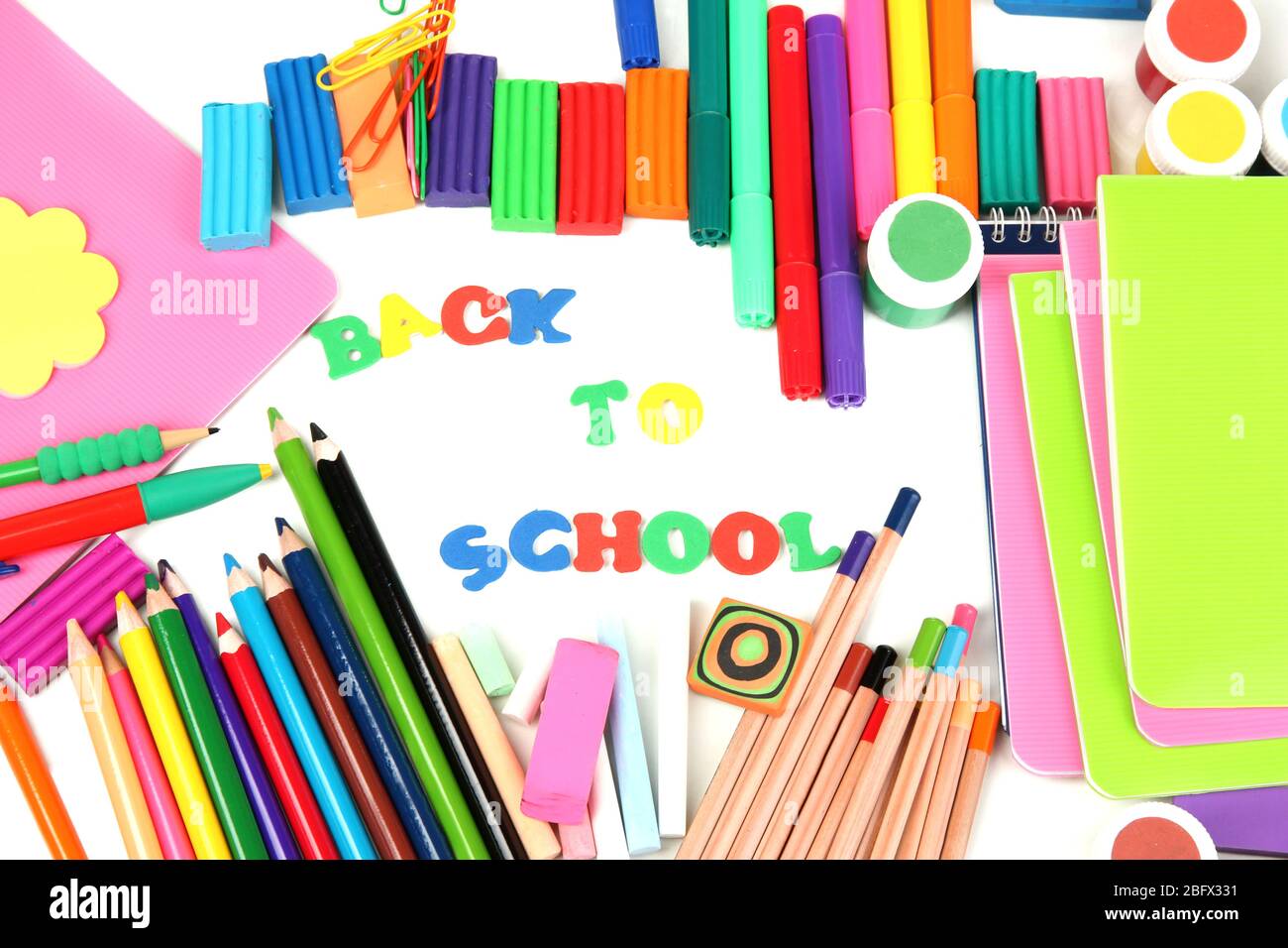 The words 'Back to School' composed of letters with various school ...