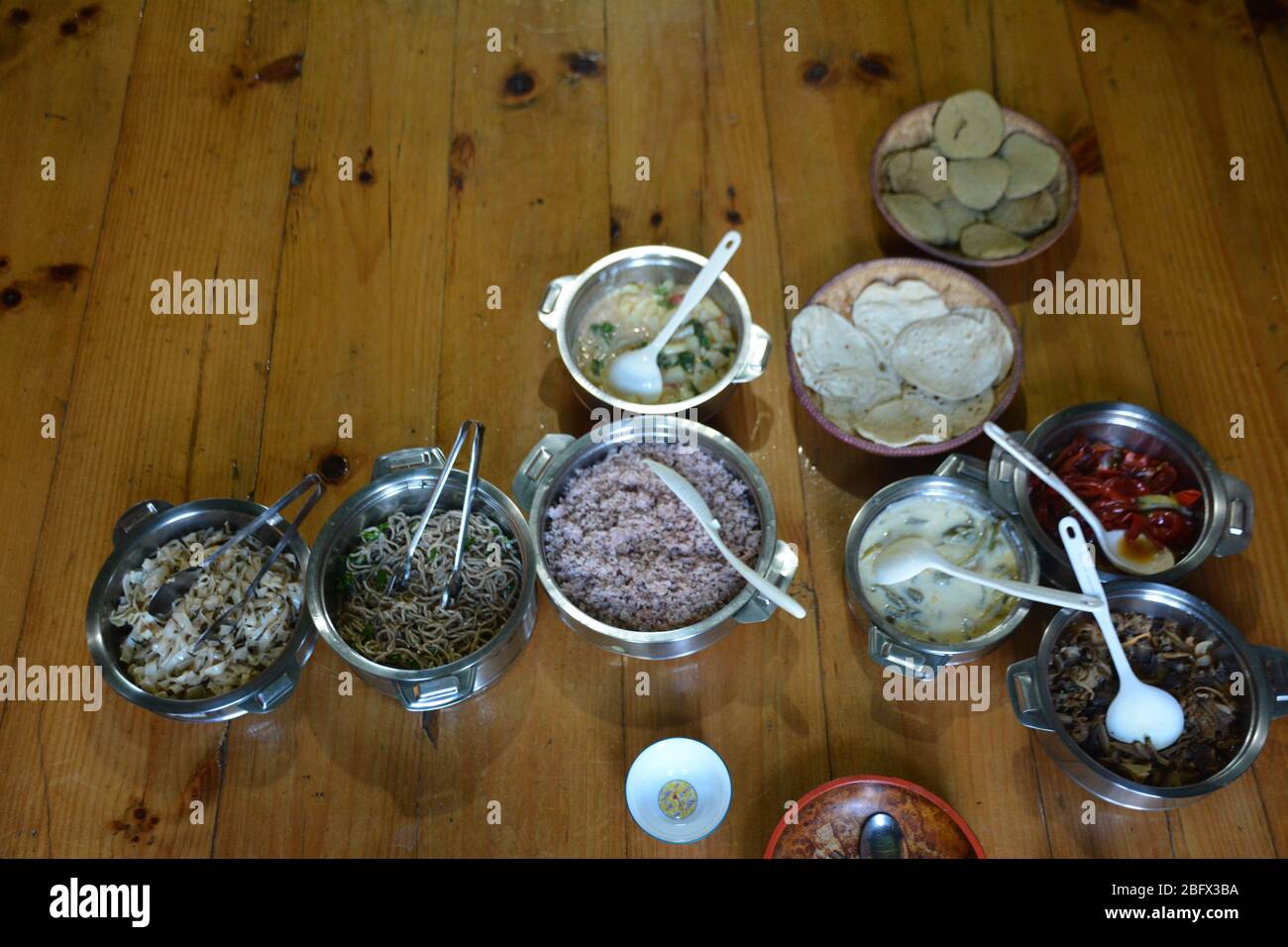 A Bhutanese farmhouse meal of handmade buckwheat noodles, potato curry ...