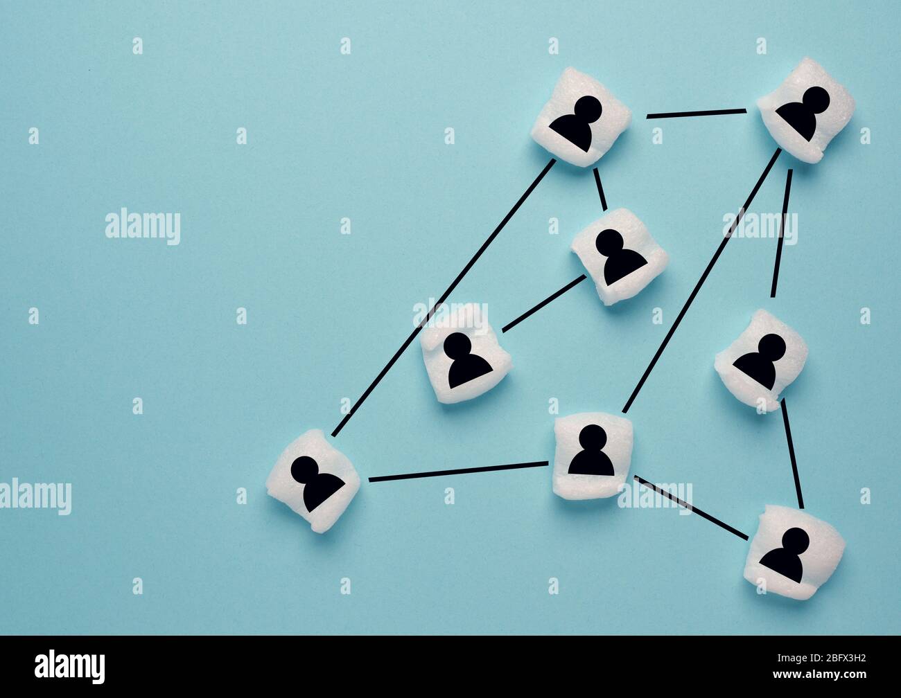 Abstract teamwork, network and community concept on a blue paper ...