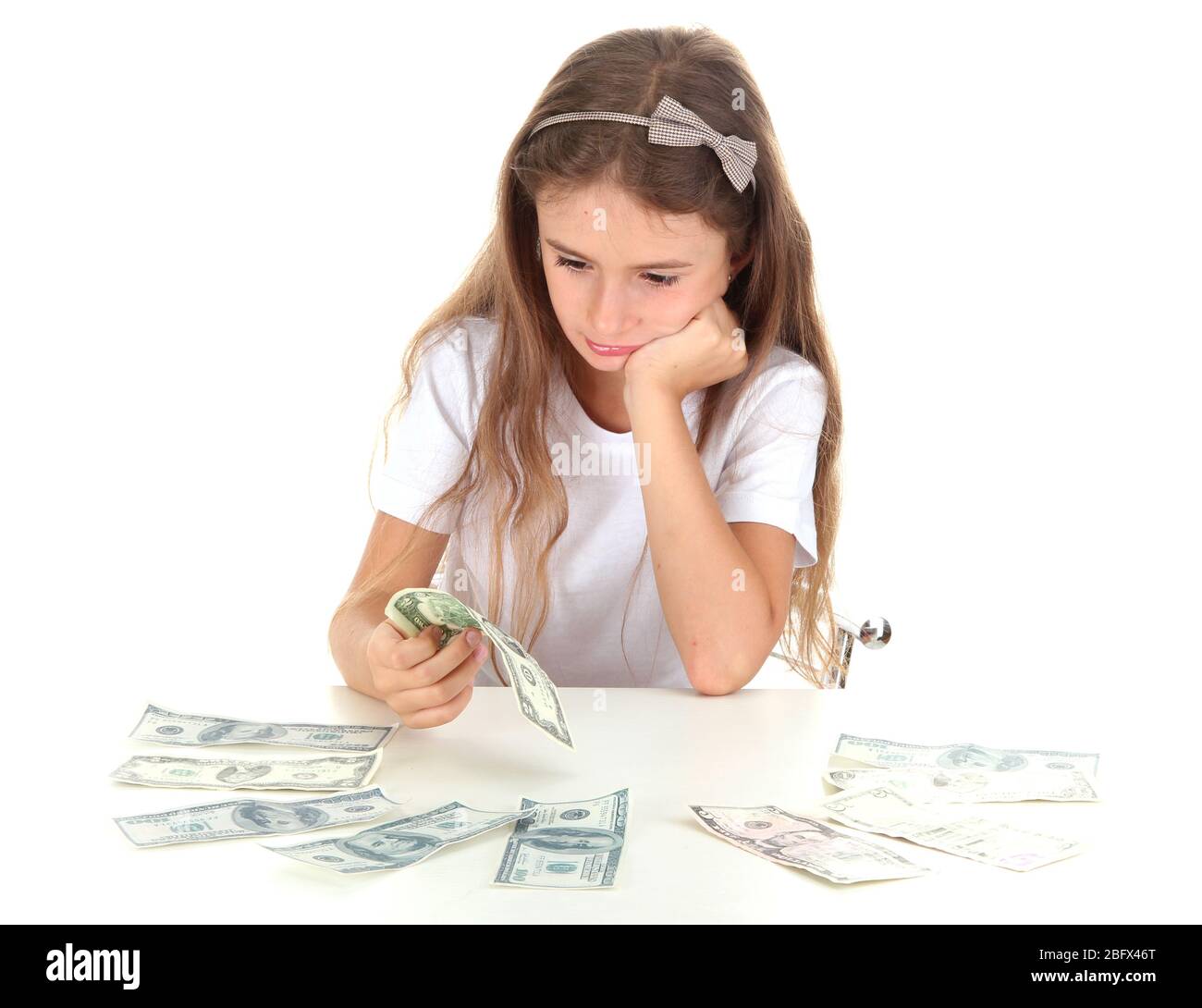 beautiful little girl with money, isolated on white Stock Photo - Alamy