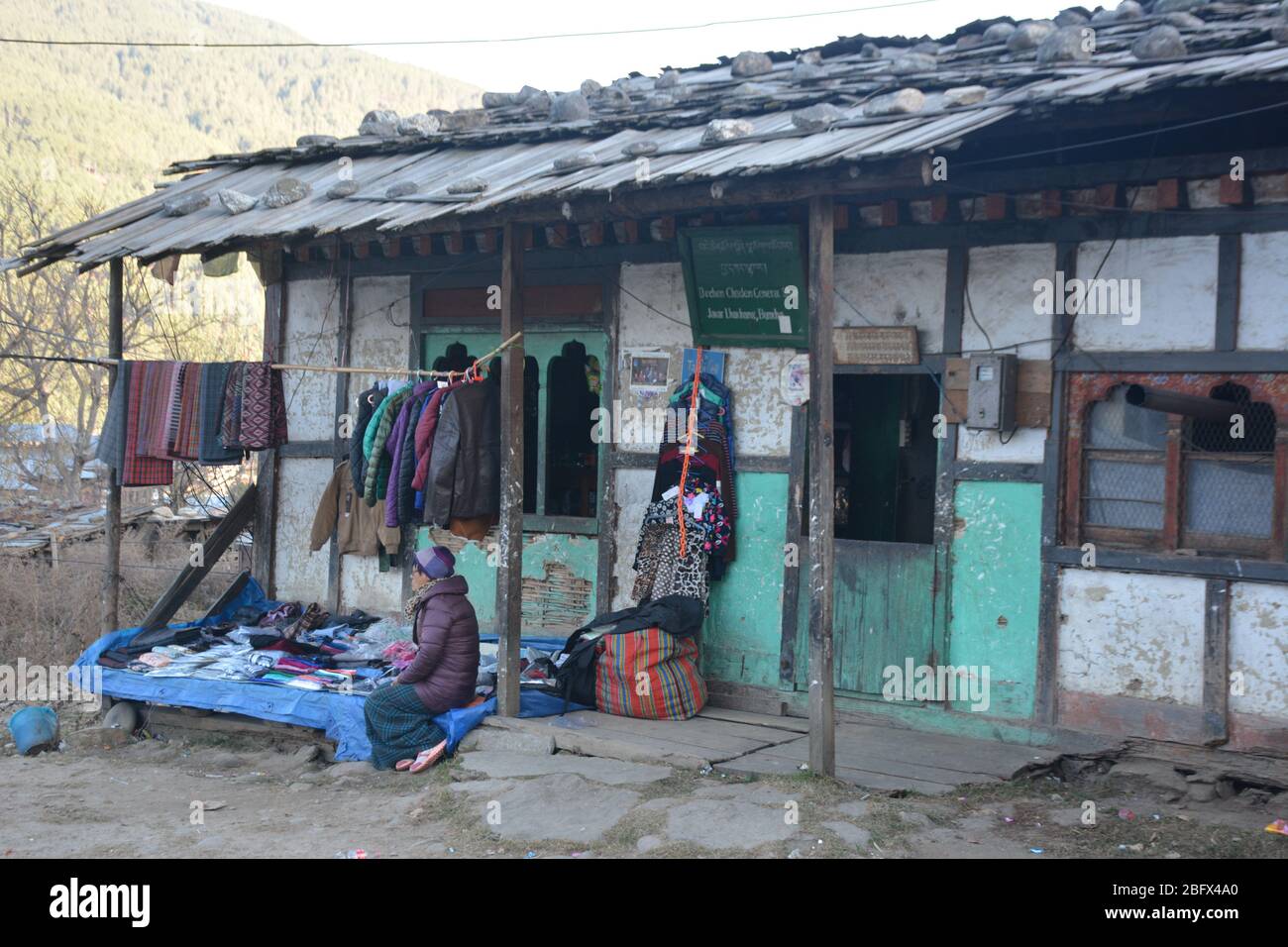 A small roadside clothes shop in Bumthang, Bhutan Stock Photo - Alamy