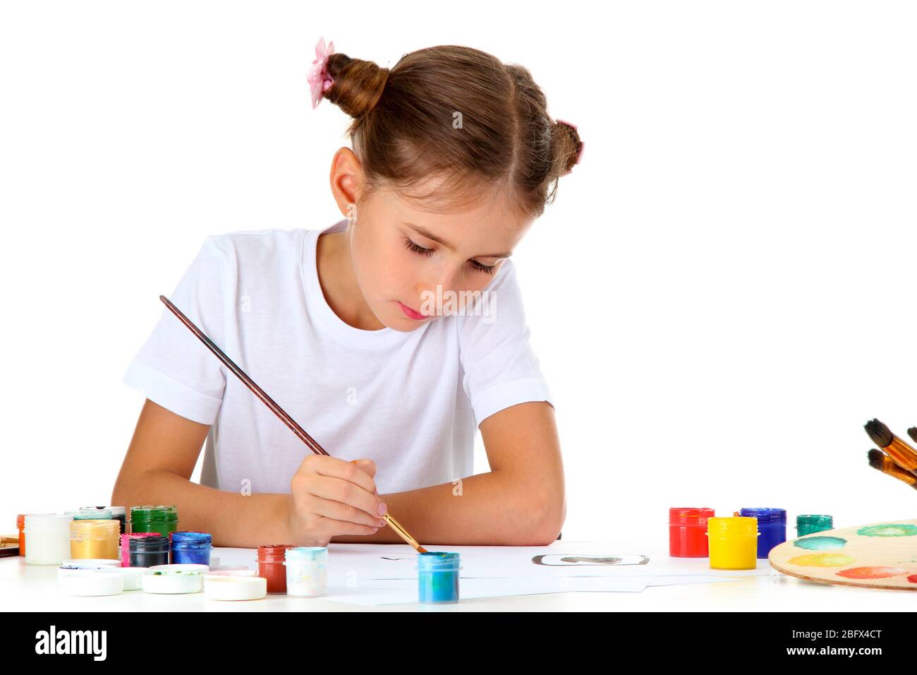 Cute little girl painting a picture, isolated on white Stock Photo - Alamy